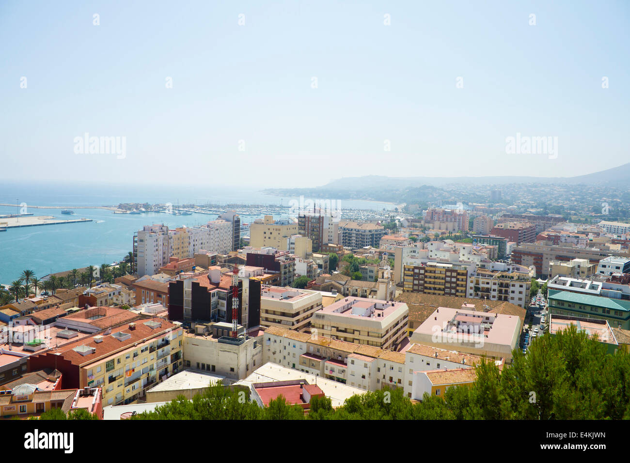 Typical Spanish village with white walls and red roofs, Denia Spain ...