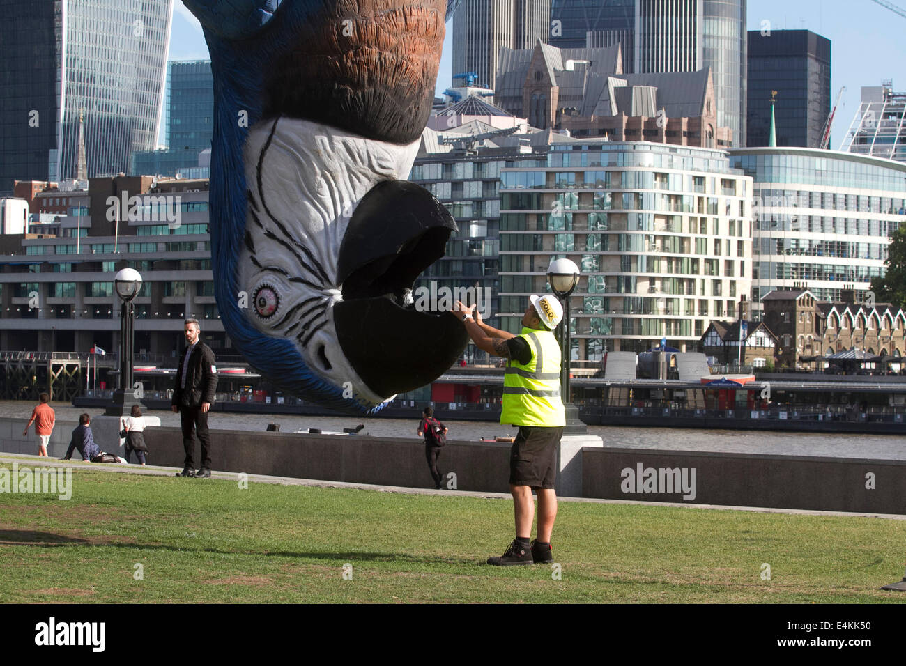 London, UK. 14th July, 2014. A giant sculpture of a dead blue parrot ...