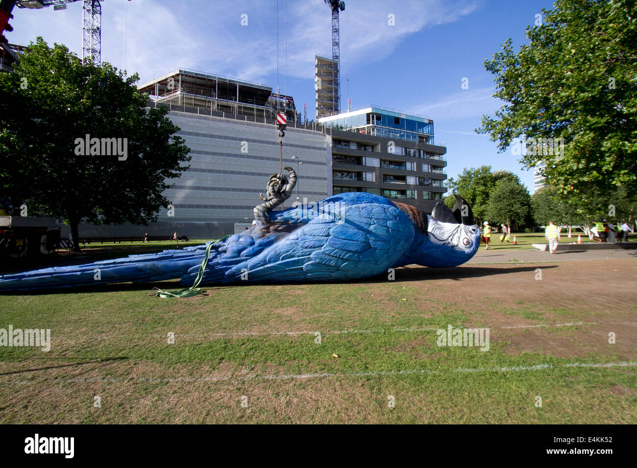 London, UK. 14th July, 2014. A giant sculpture of a dead blue parrot ...