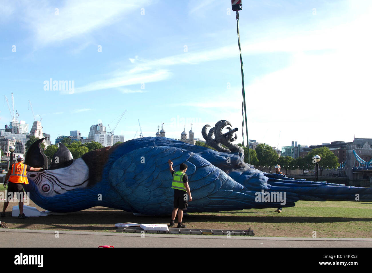 London, UK. 14th July, 2014. A giant sculpture of a dead blue parrot ...
