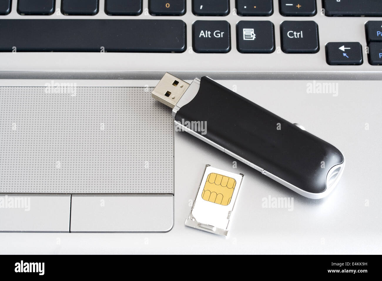 Notebook with modem usb Stock Photo - Alamy