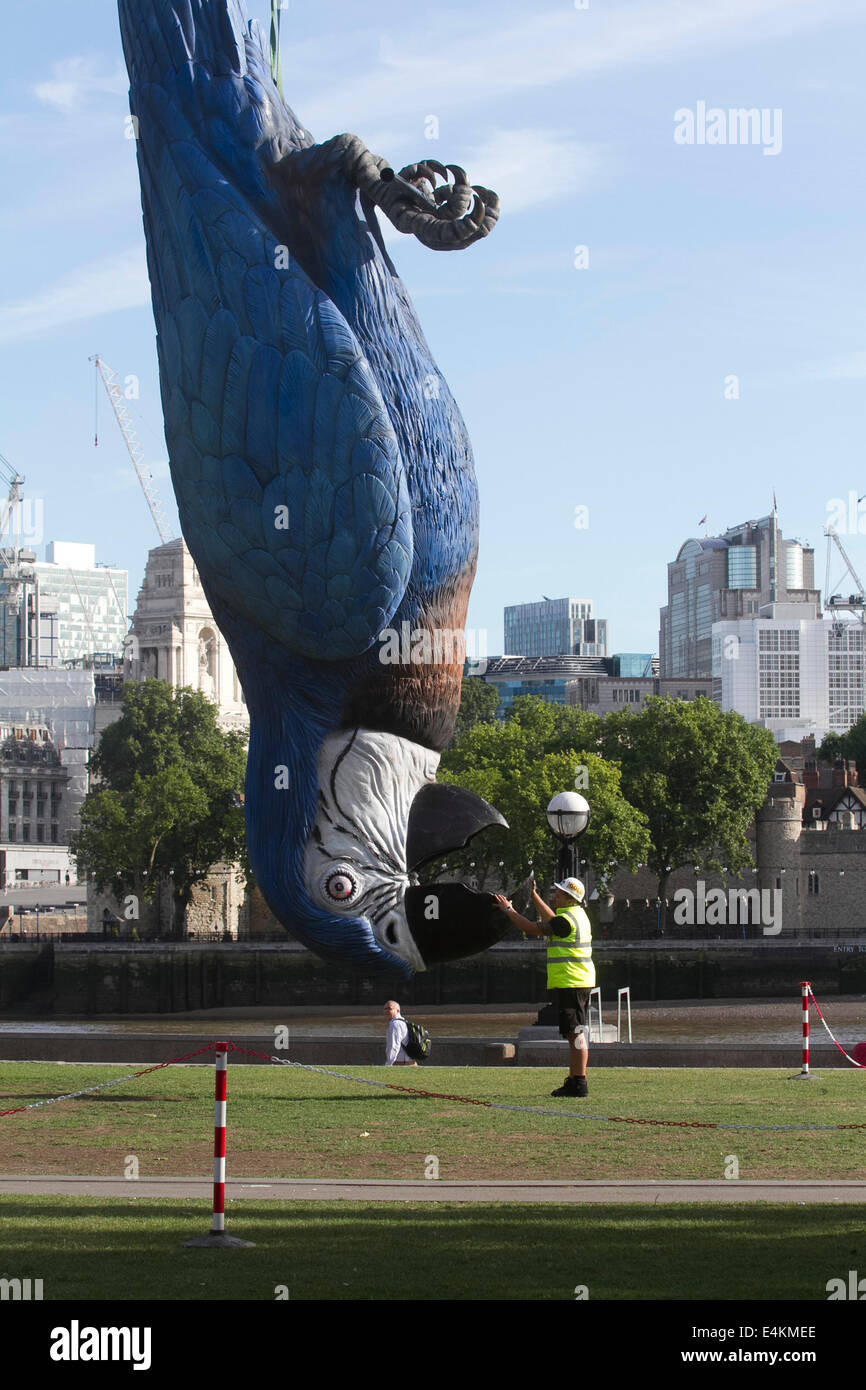 London, UK. 14th July, 2014. A giant sculpture of a dead blue parrot ...