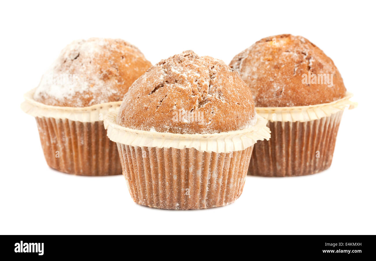 Three muffins on white background Stock Photo - Alamy
