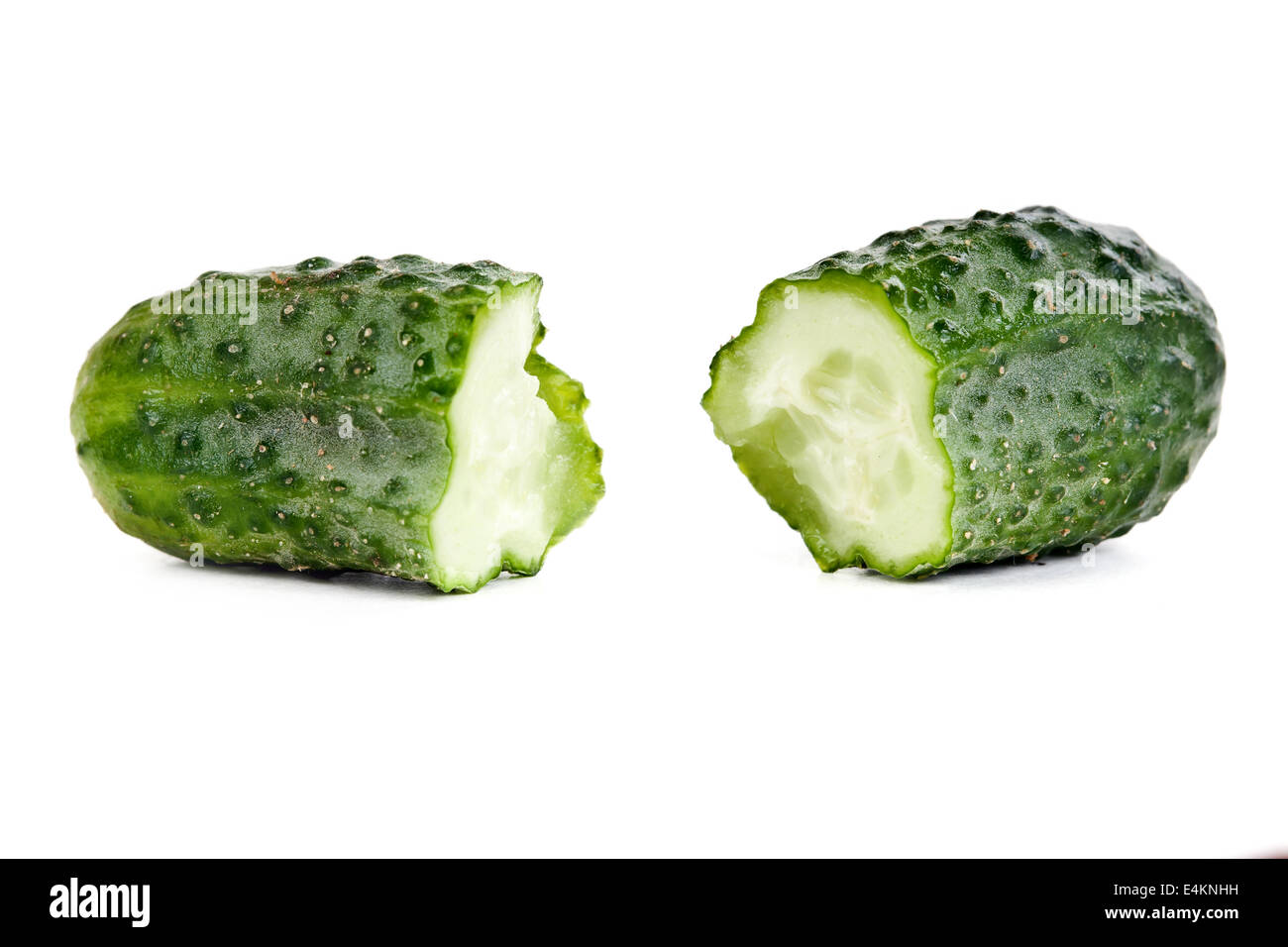 ripe cucumber is broken in half Stock Photo - Alamy