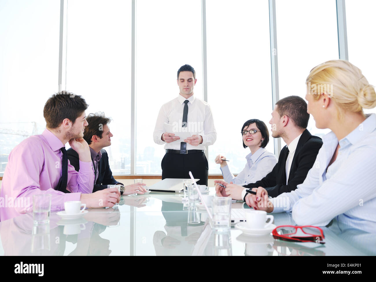 group of business people at meeting Stock Photo - Alamy