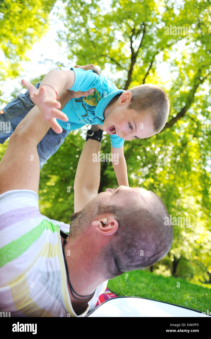 happy father and son have fun at park Stock Photo - Alamy