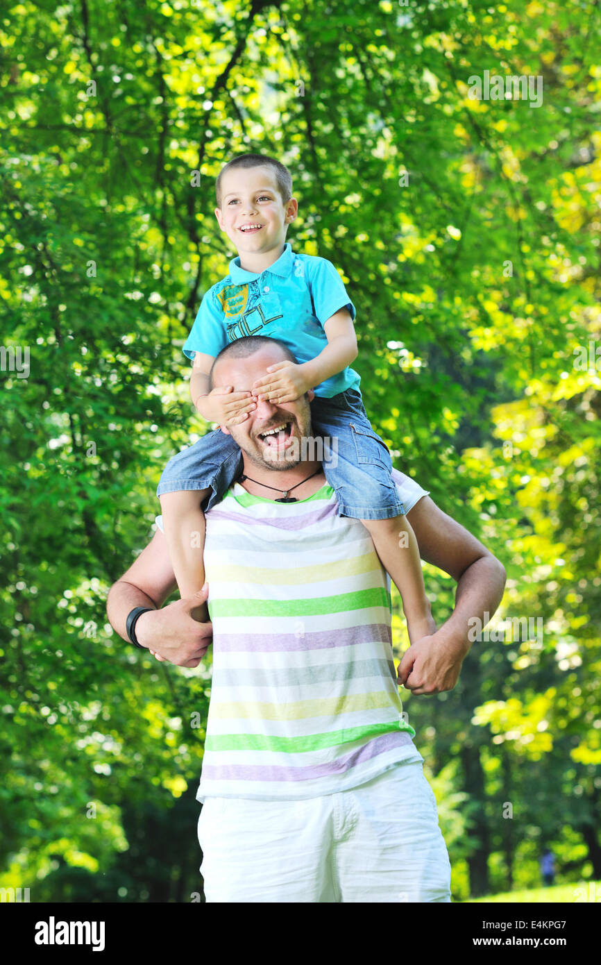 happy father and son have fun at park Stock Photo - Alamy