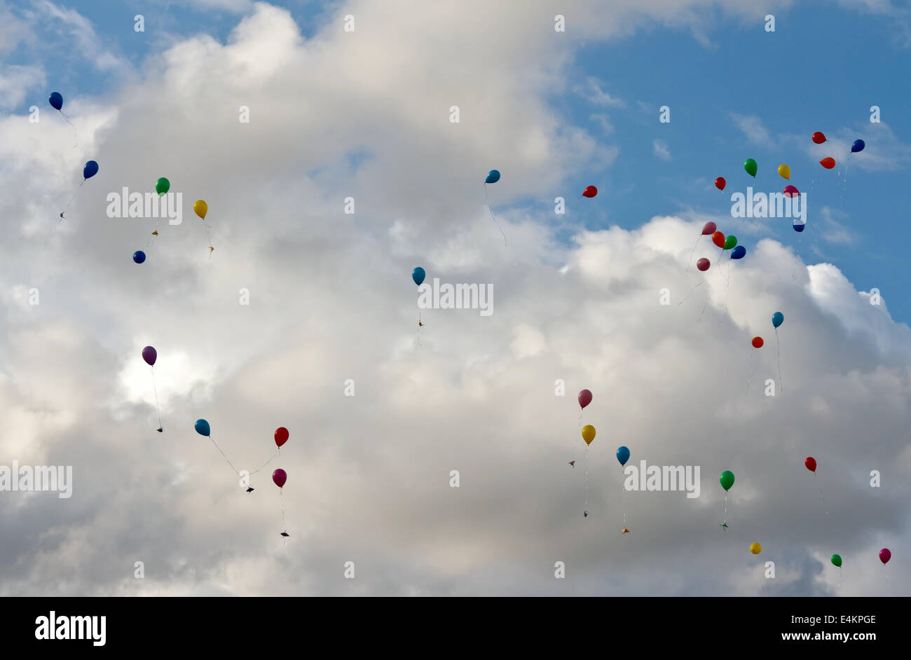 colored balloons flying in the sky Stock Photo - Alamy