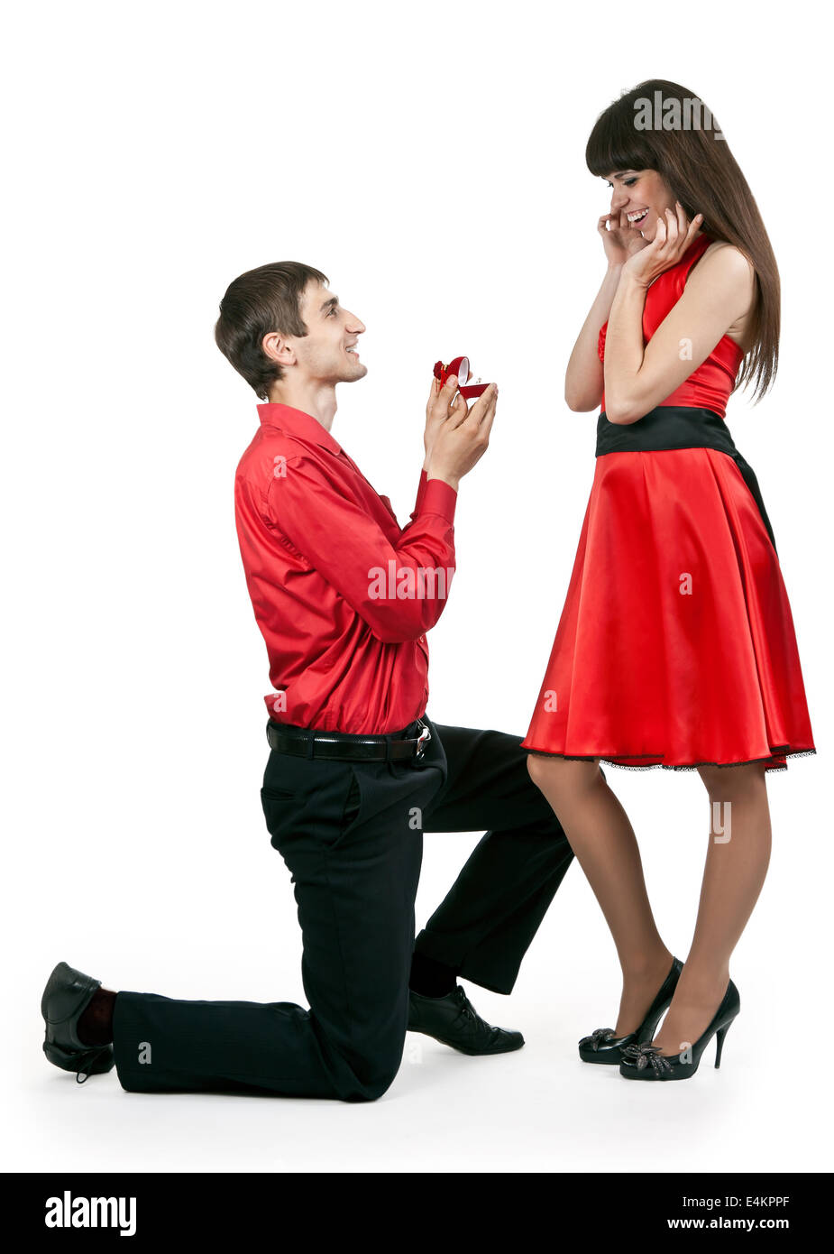 man gives the woman a ring Stock Photo - Alamy