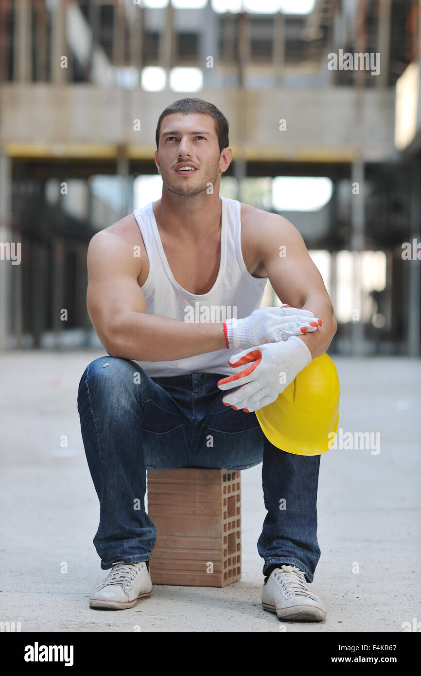 hard worker on construction site Stock Photo - Alamy