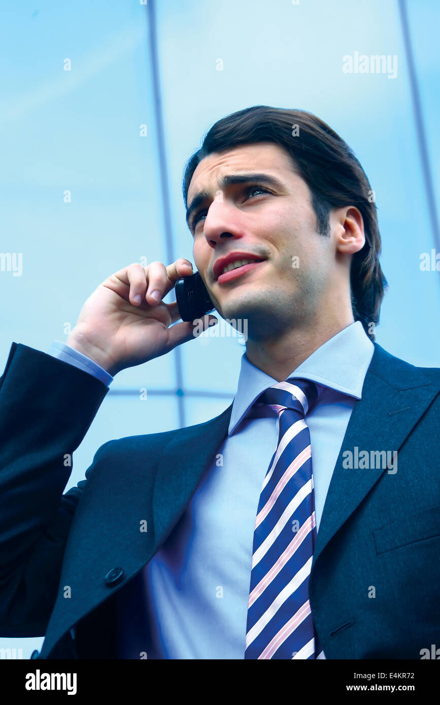 Businessman using a mobile phone Stock Photo - Alamy