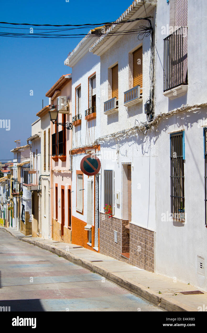 Spanish street with typical houses in Denia, Spain Stock Photo - Alamy