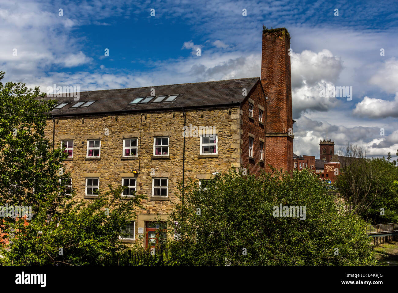 Converted old mill into apartments Stock Photo - Alamy