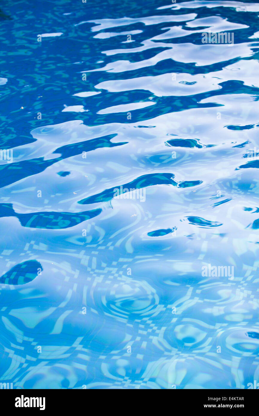Waves on a surface of water in pool Stock Photo - Alamy