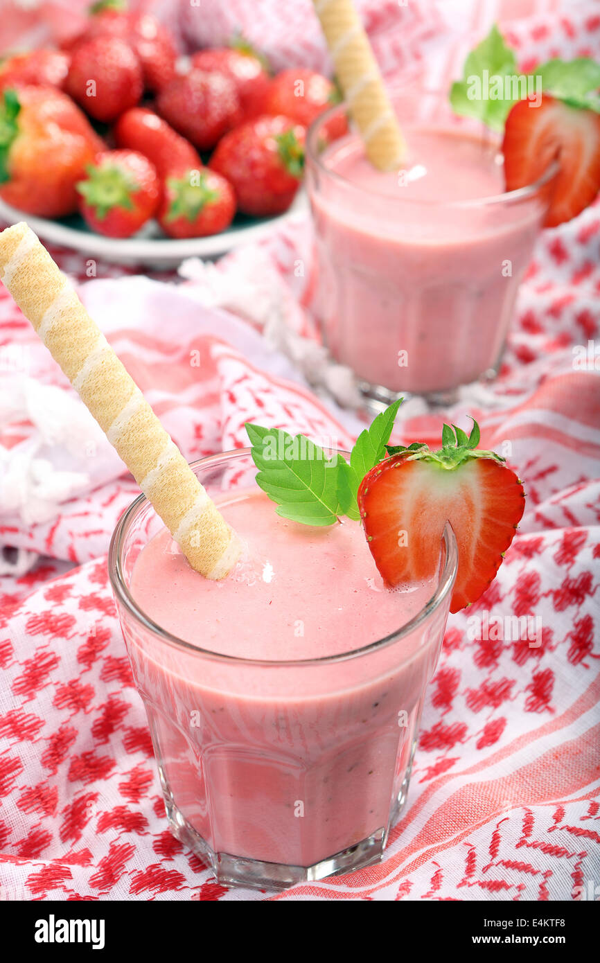 Healthy fresh strawberry cocktail with crispy tube Stock Photo - Alamy