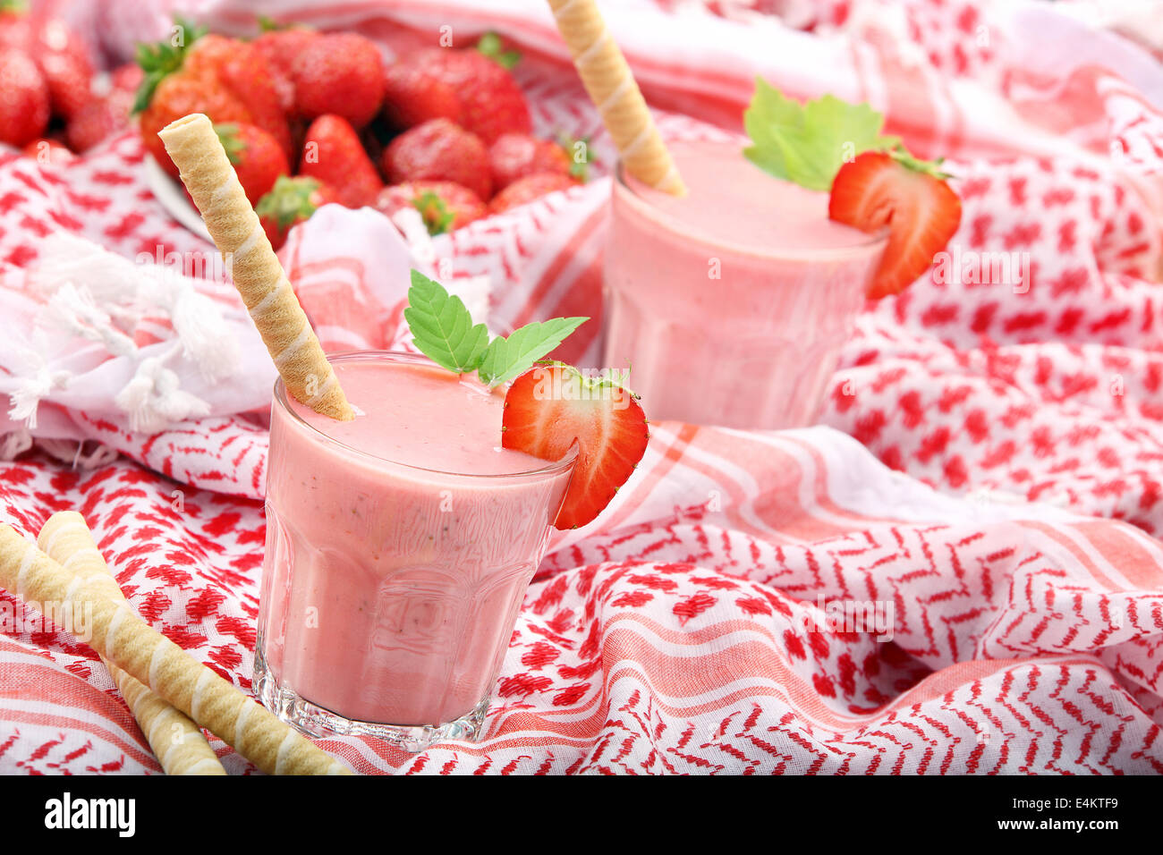 Healthy fresh strawberry cocktail with crispy tube Stock Photo - Alamy