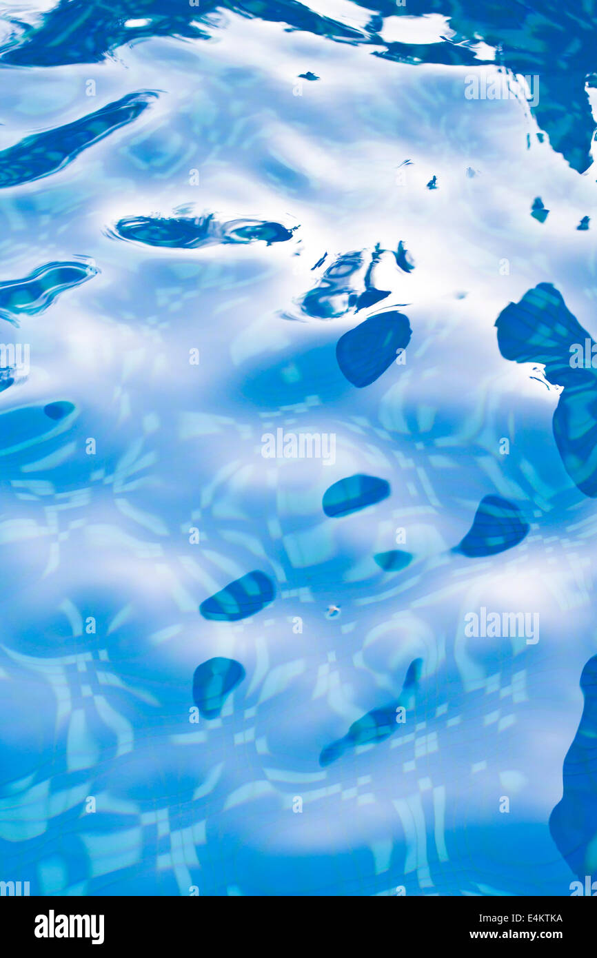 Waves on a surface of water in pool Stock Photo - Alamy