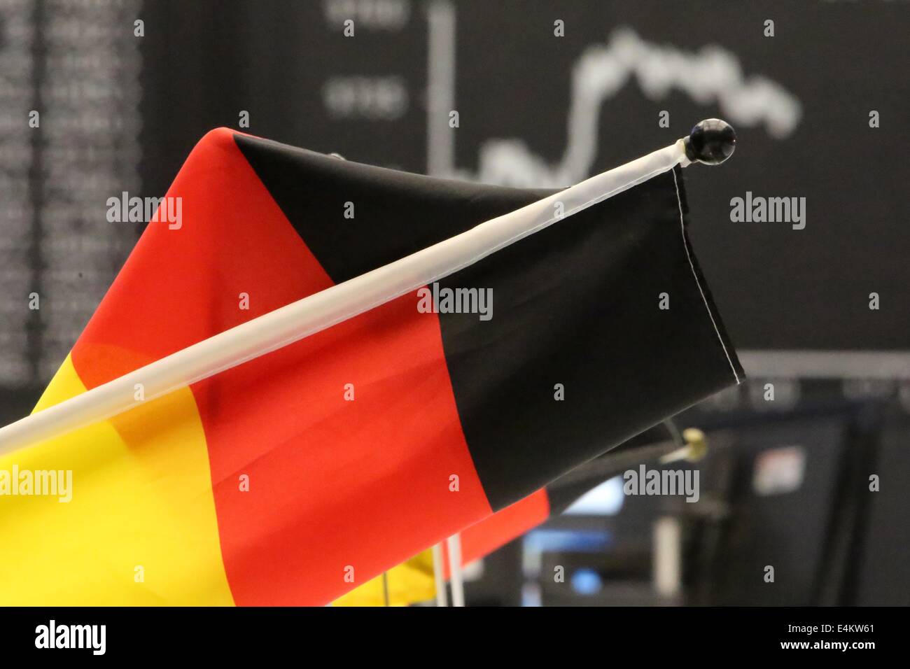 The graph of the German stock index (DAX) is displayed behind a Germany ...