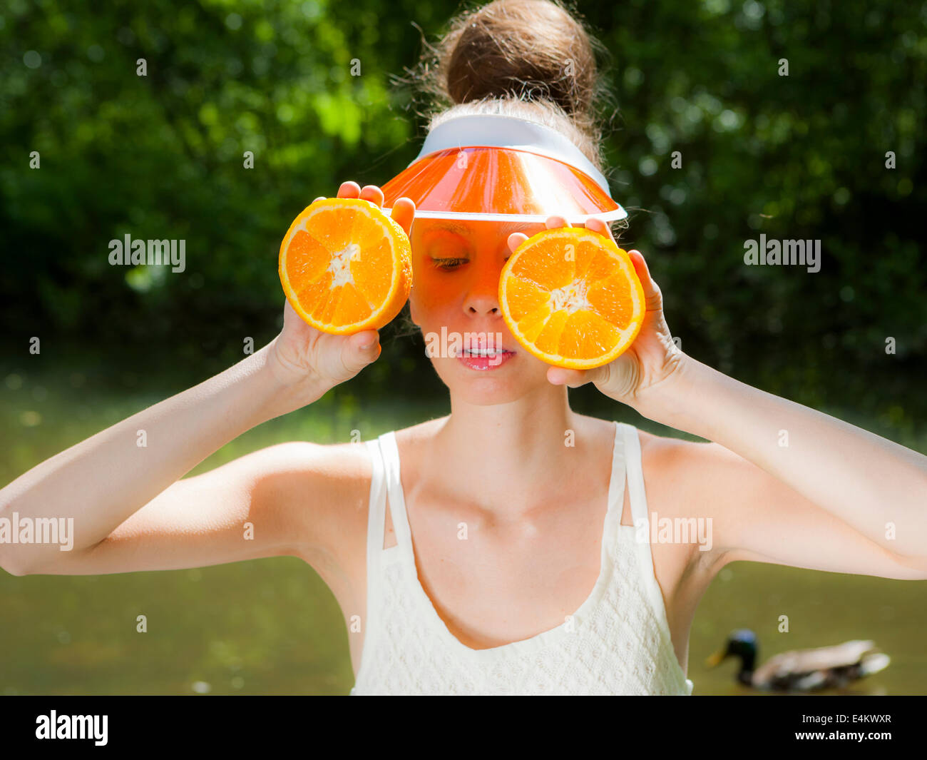 Woman summer orange fruit hi-res stock photography and images - Alamy