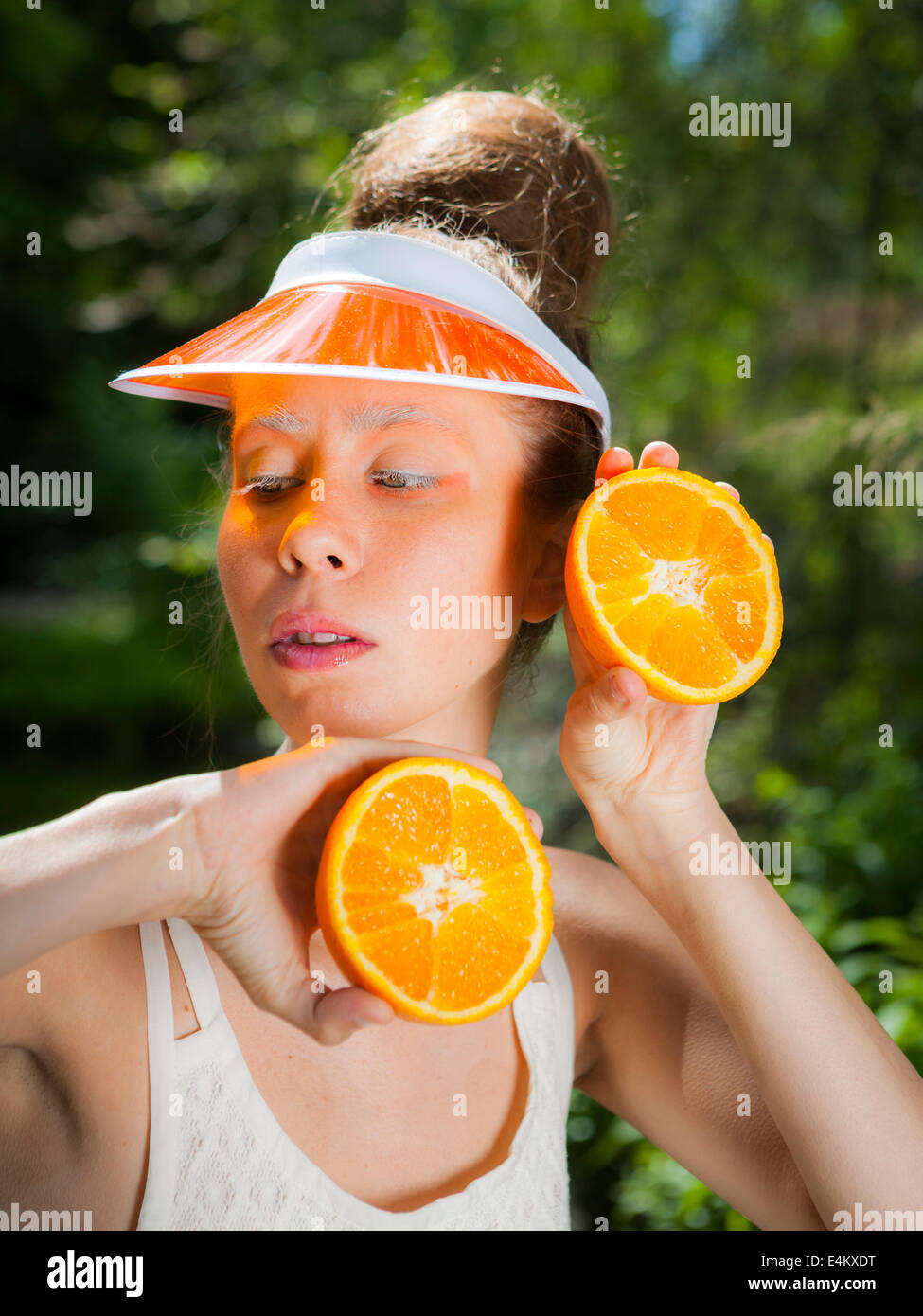 Woman summer orange fruit hi-res stock photography and images - Alamy