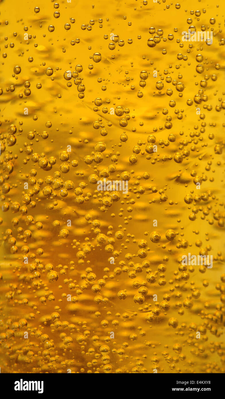 Golden bubbles of beer texture, for background Stock Photo - Alamy