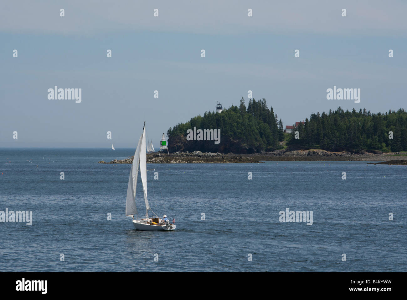 Maine, Rockland, Penobscot Bay. Sailboat in front of Owls Head State ...