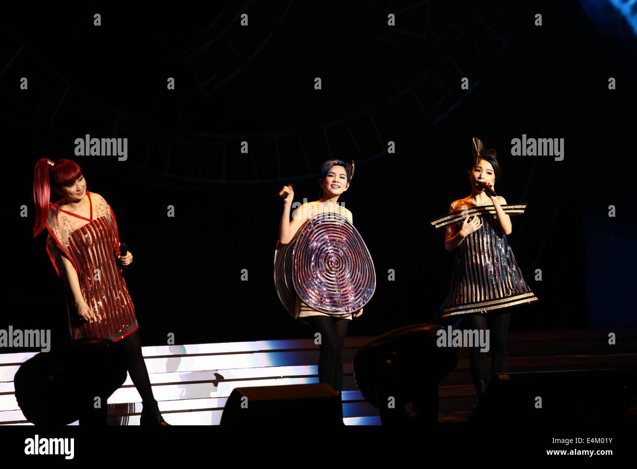 Taiwan pop girl group S.H.E. perform on the stage of their Shanghai ...