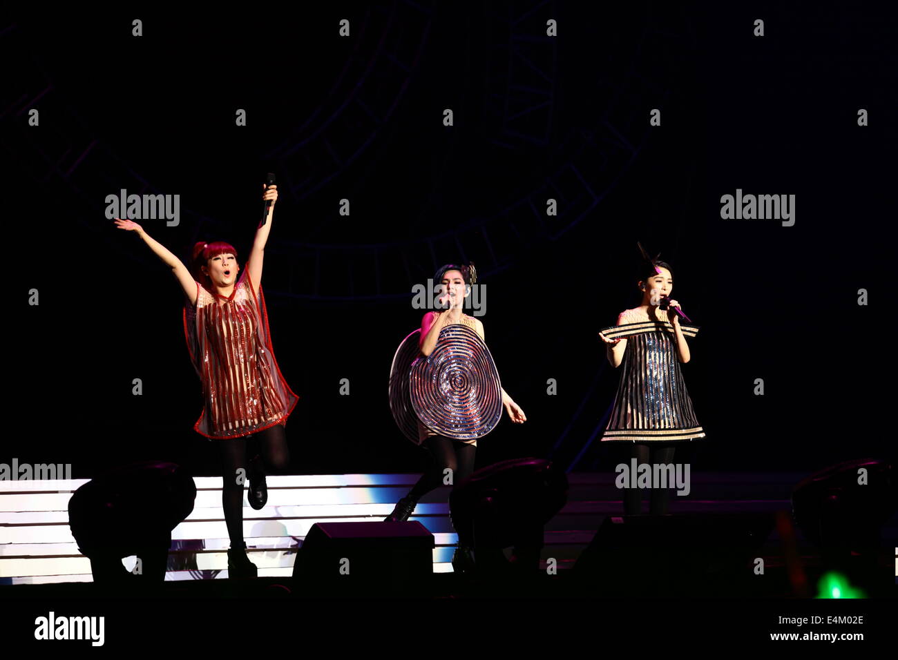 Taiwan pop girl group S.H.E. perform on the stage of their Shanghai ...
