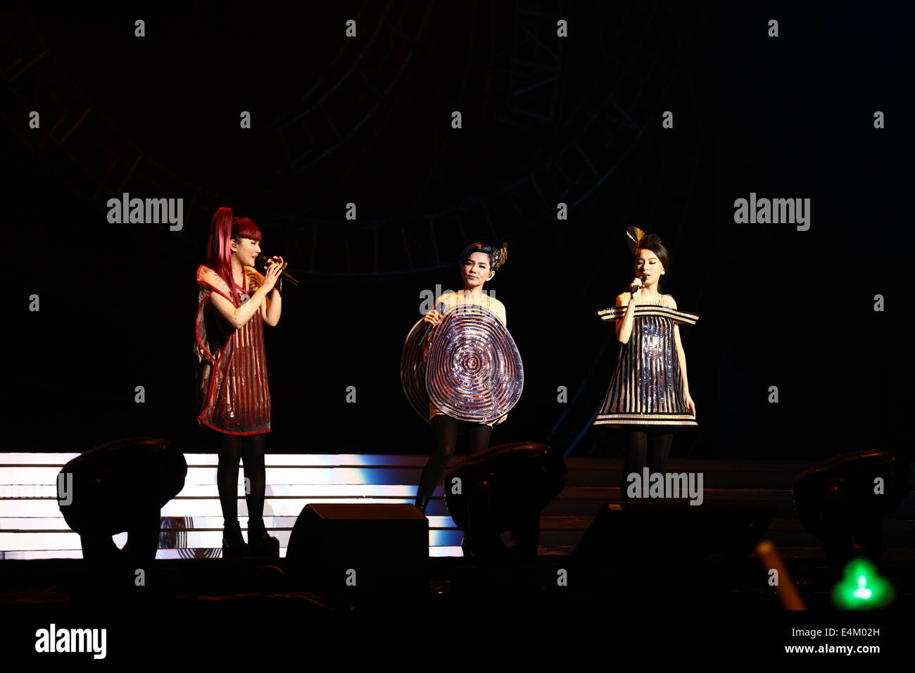 Taiwan pop girl group S.H.E. perform on the stage of their Shanghai ...