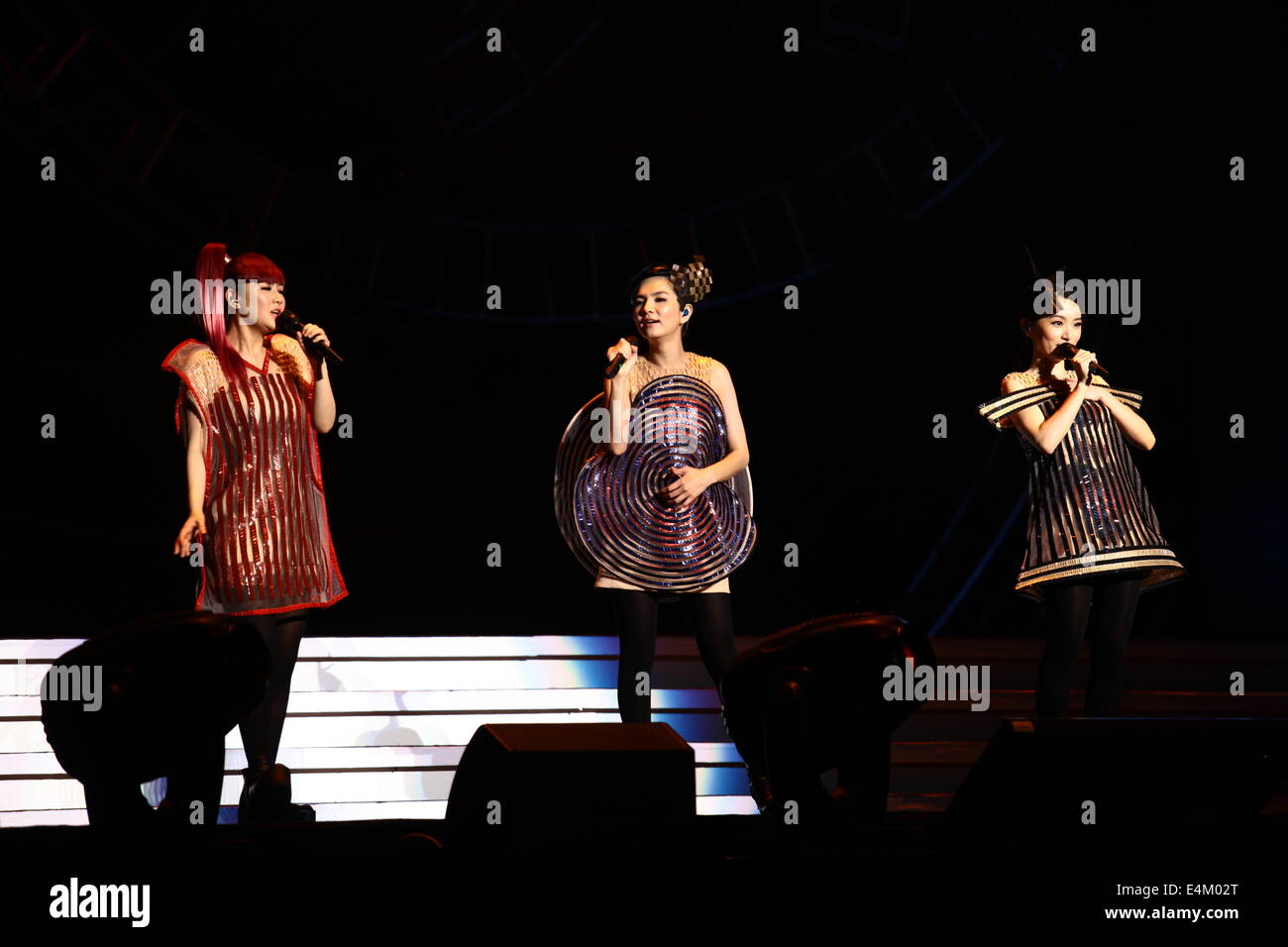 Taiwan pop girl group S.H.E. perform on the stage of their Shanghai ...