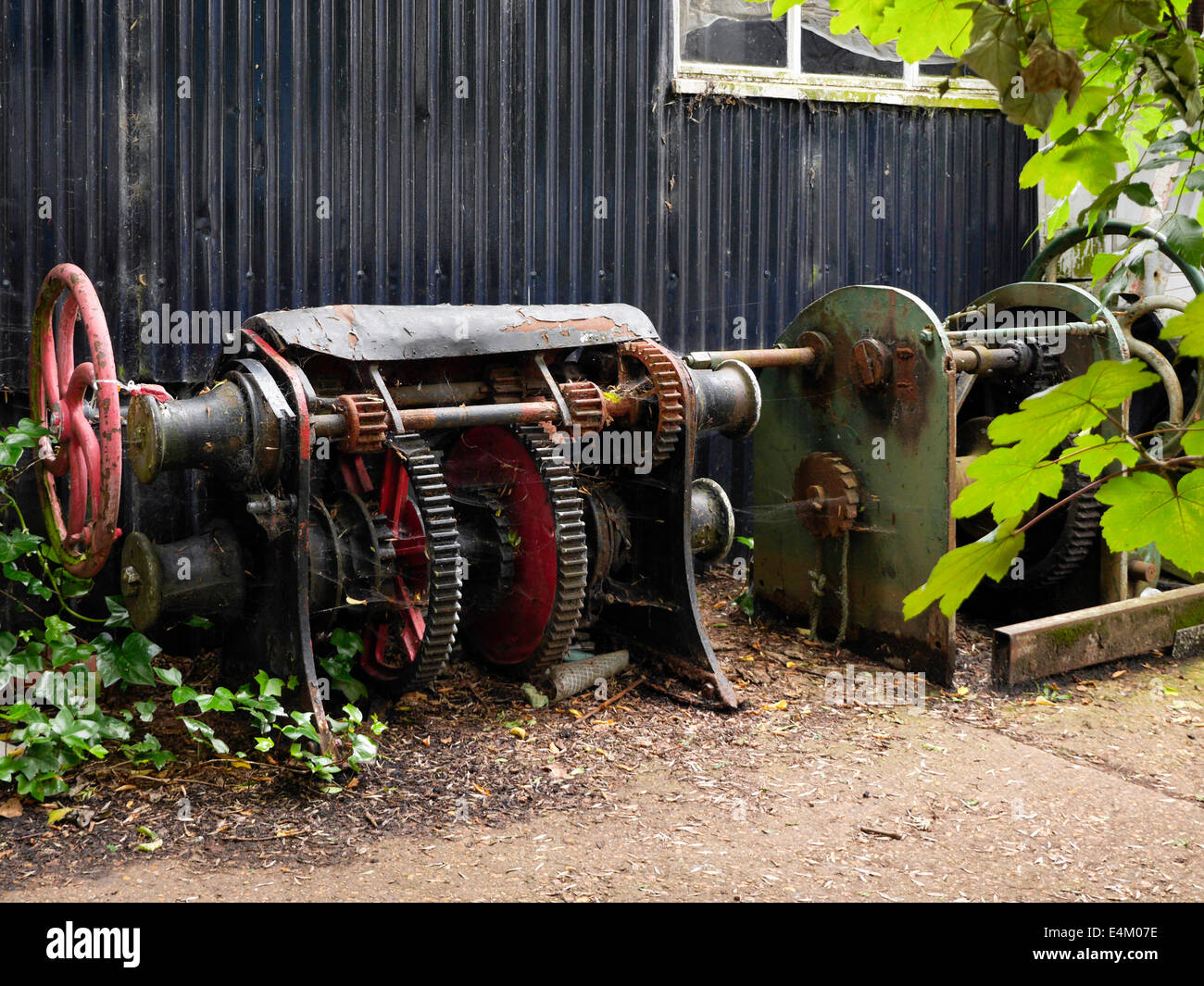 Rusty old machinery - cog wheel and gear wheels in working boatyard on ...