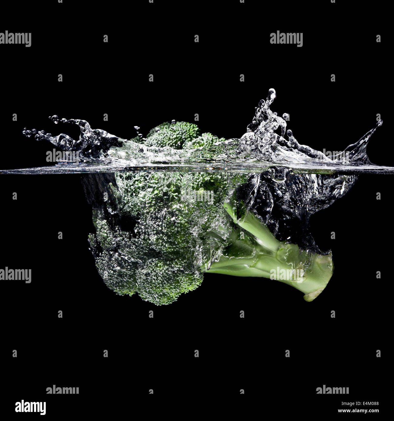 high speed photography broccoli splash in water Stock Photo - Alamy