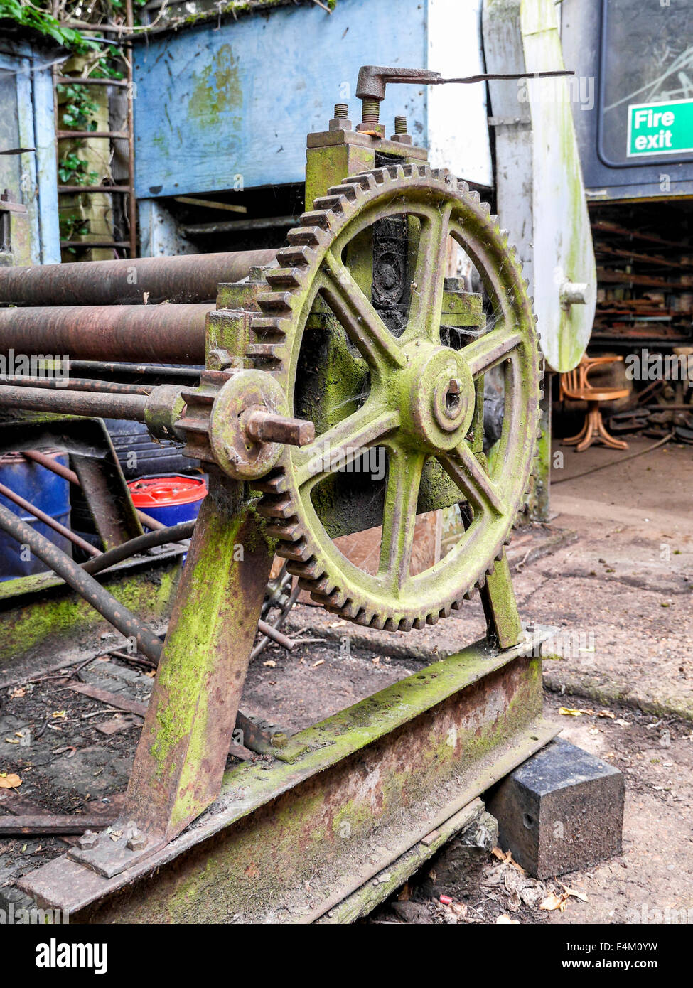 Rusty old machinery - cog wheel and rollers in working boatyard on on ...
