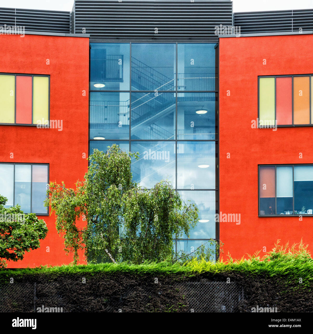 Modern orange office building in Chertsey Road Stock Photo - Alamy