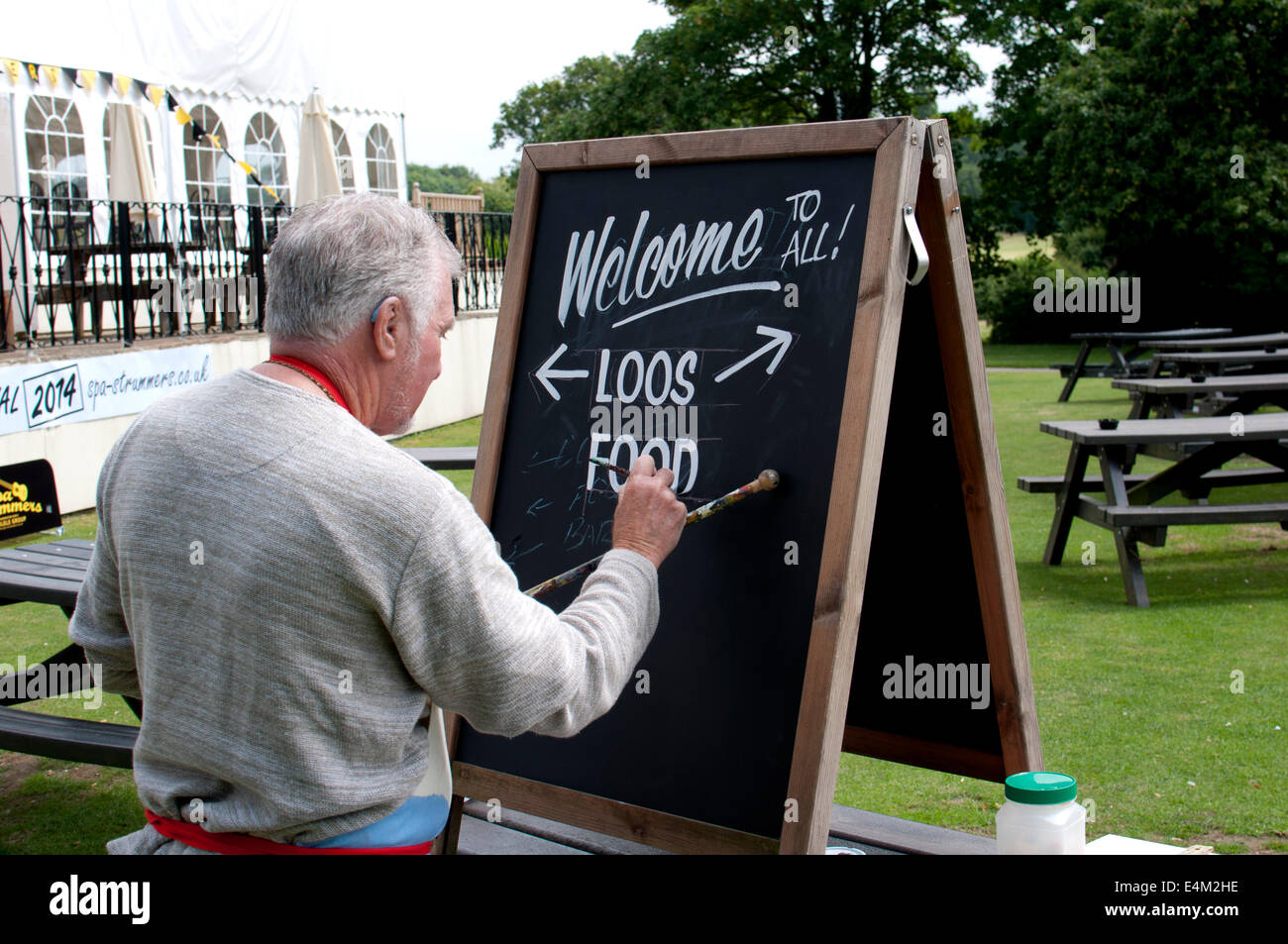 Signwriter making a sign Stock Photo - Alamy