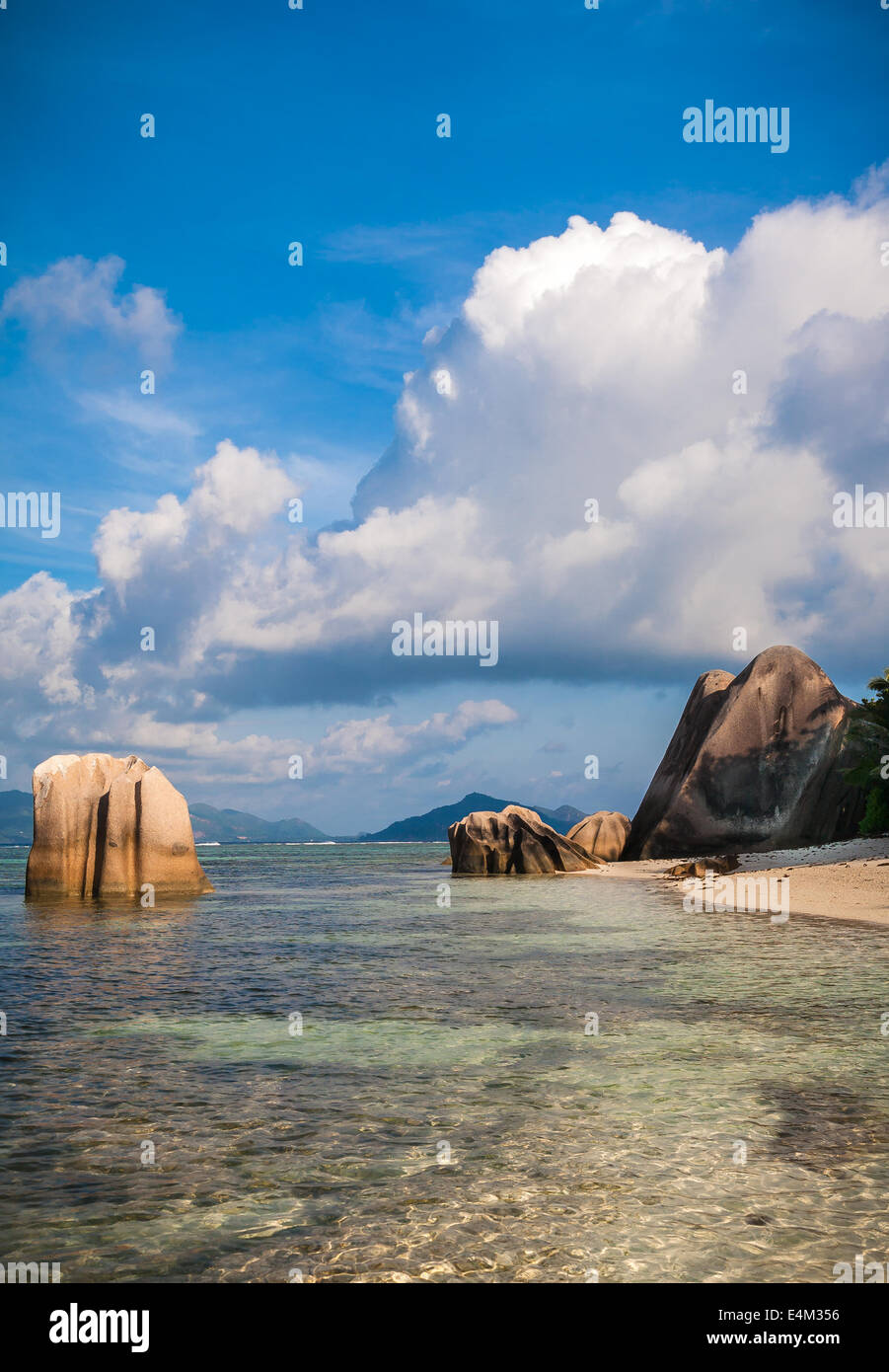Standing Granite Boulders On Tropical Beach Stock Photo - Alamy