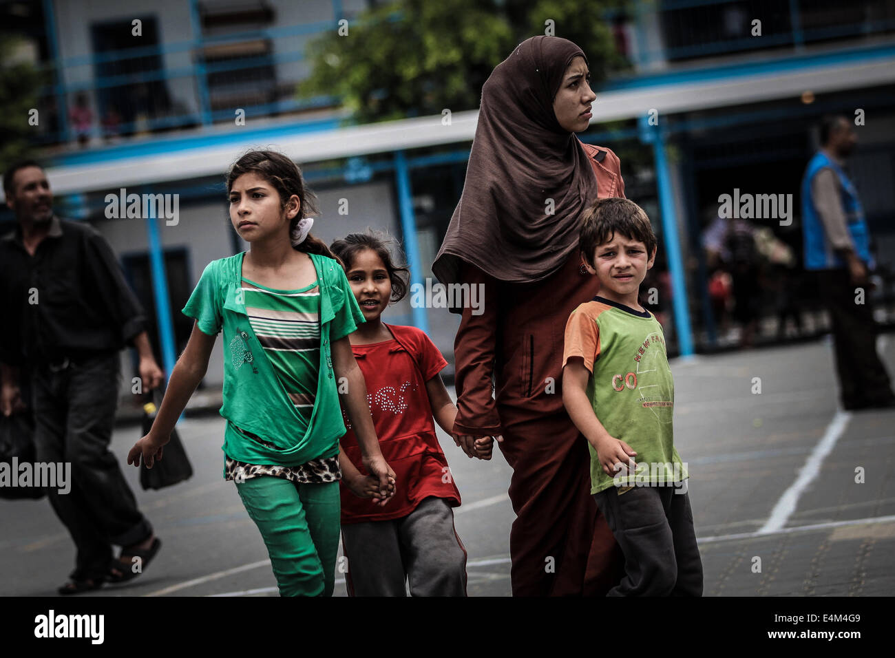Gaza, Palestinian Territories. 13th July, 2014. A Palestinian family in ...