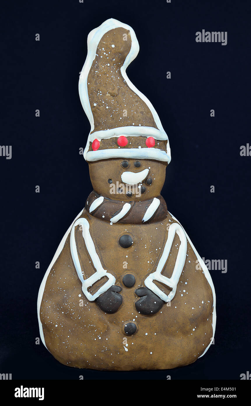 gingerbread figure, man, vertical, close up, isolated on black ...