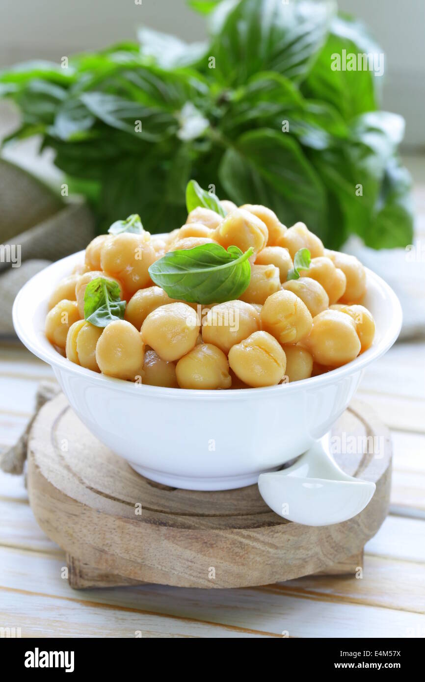 fresh roasted chickpeas with basil leaves Stock Photo - Alamy