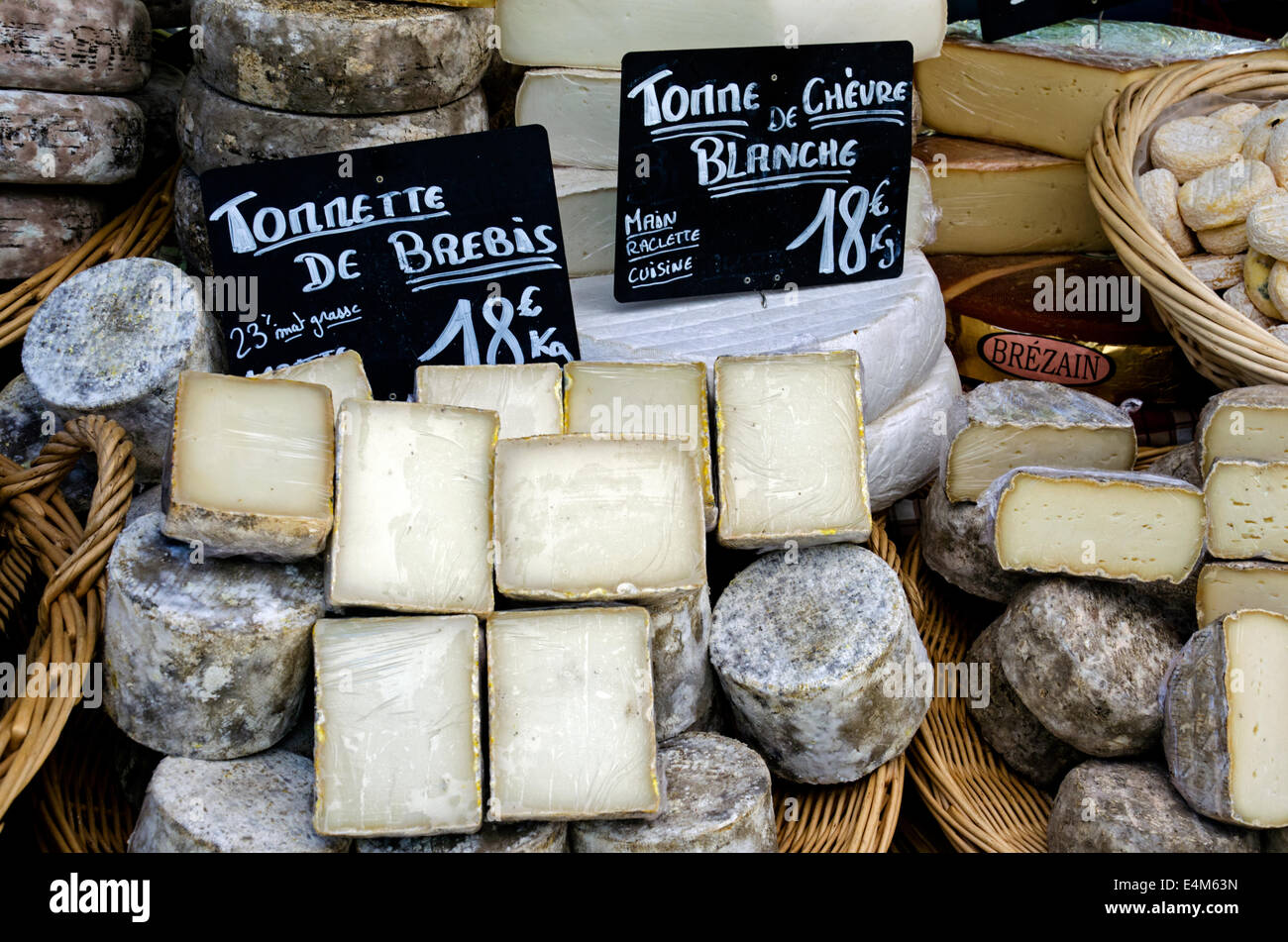 A selection of cheeses on a market stall at the Saturday market in ...