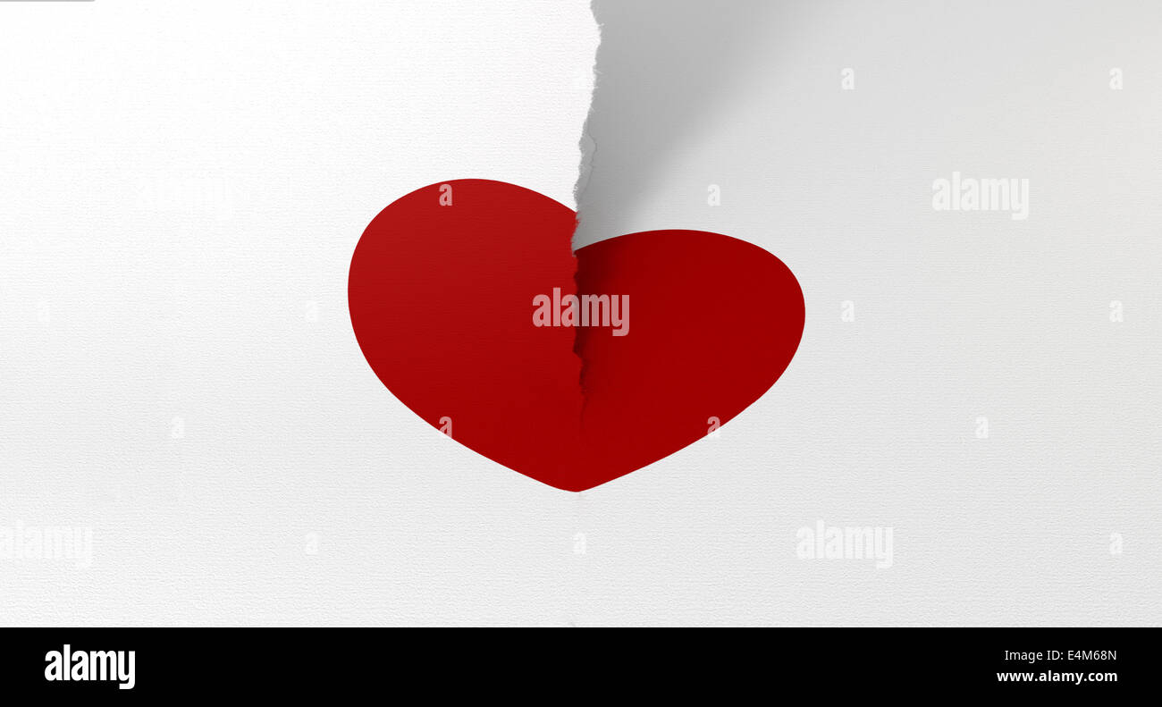 A white piece of paper tearing in two through a drawn red heart Stock ...