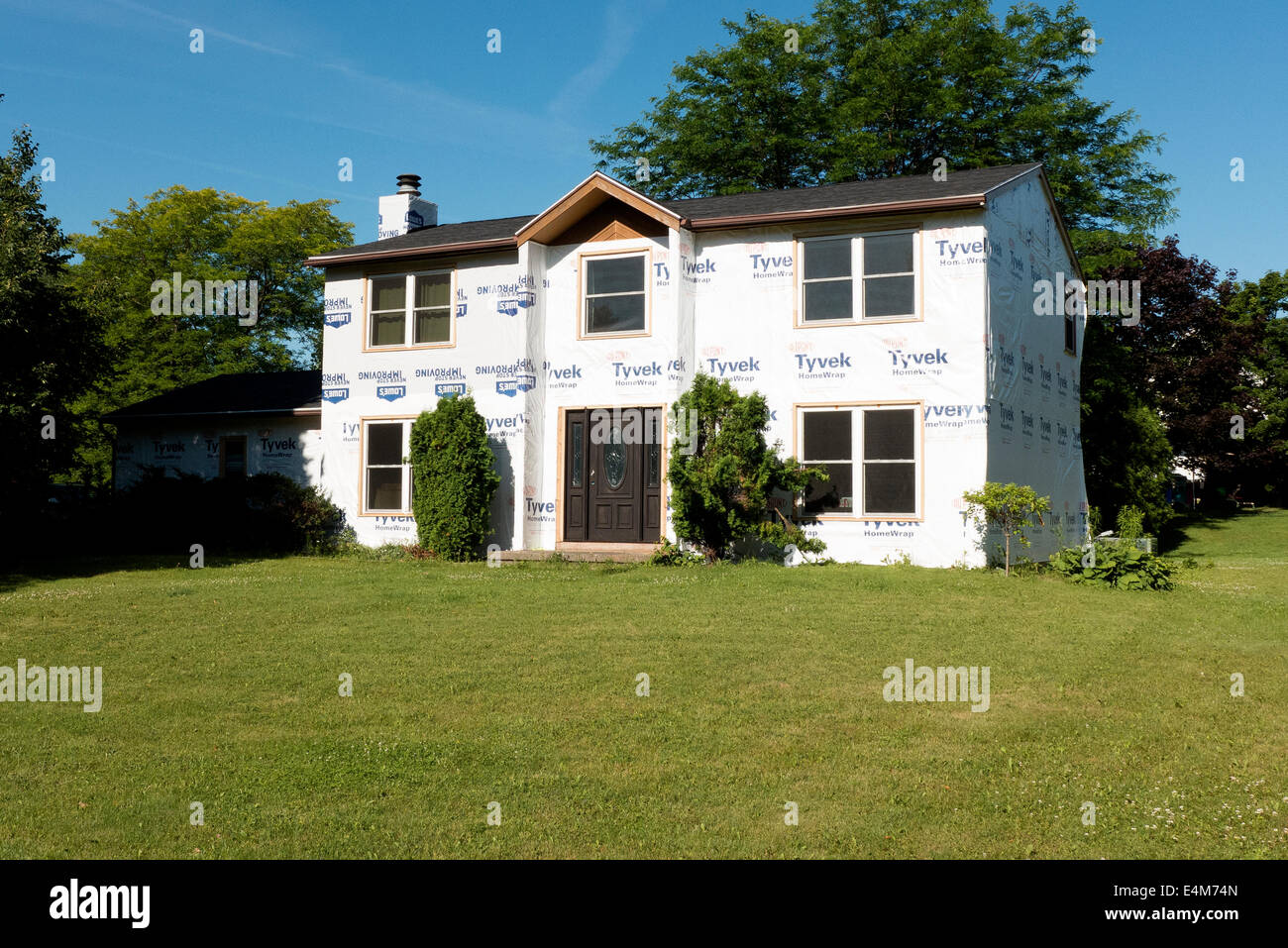 Private home being sided Stock Photo - Alamy