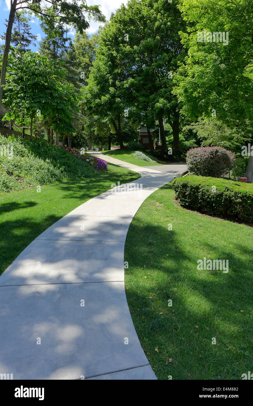 Curved pathway in park Stock Photo - Alamy