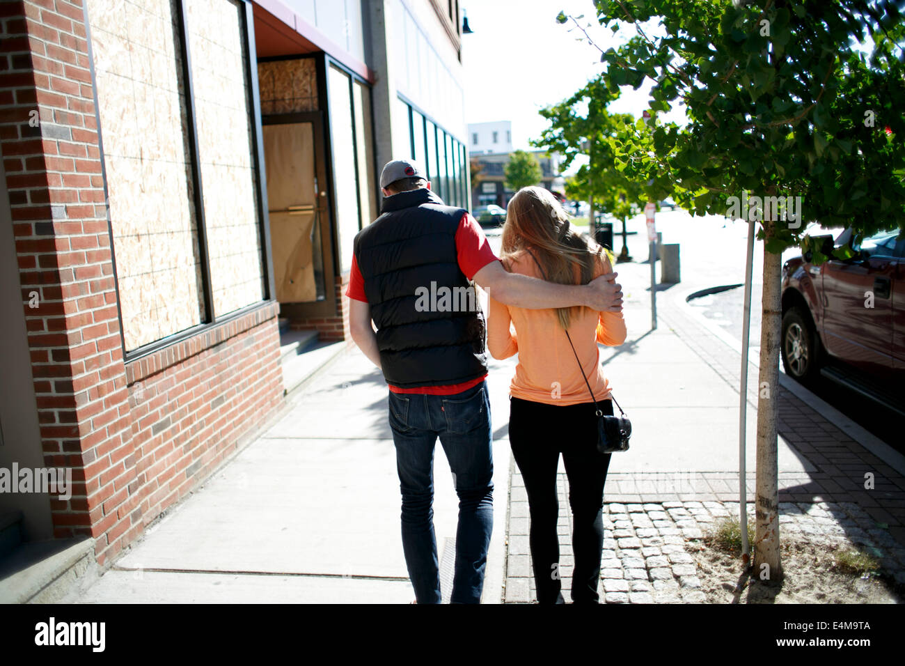 Affectionate Couple Walking on Sidewalk, Rear View Stock Photo - Alamy