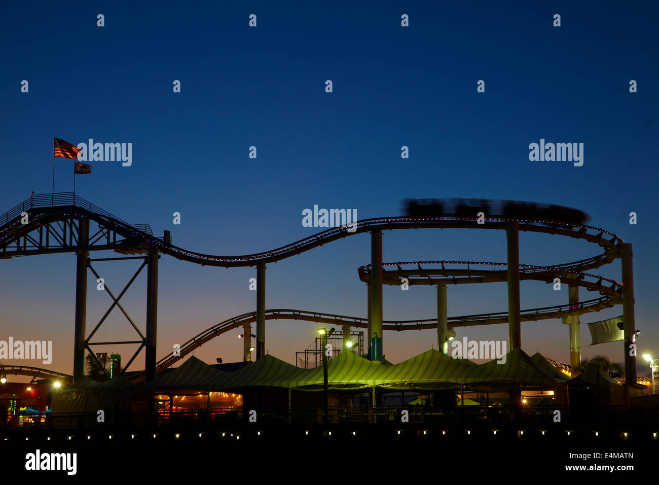 Roller coaster at sunset, Pacific Park, Santa Monica Pier, Santa Monica ...