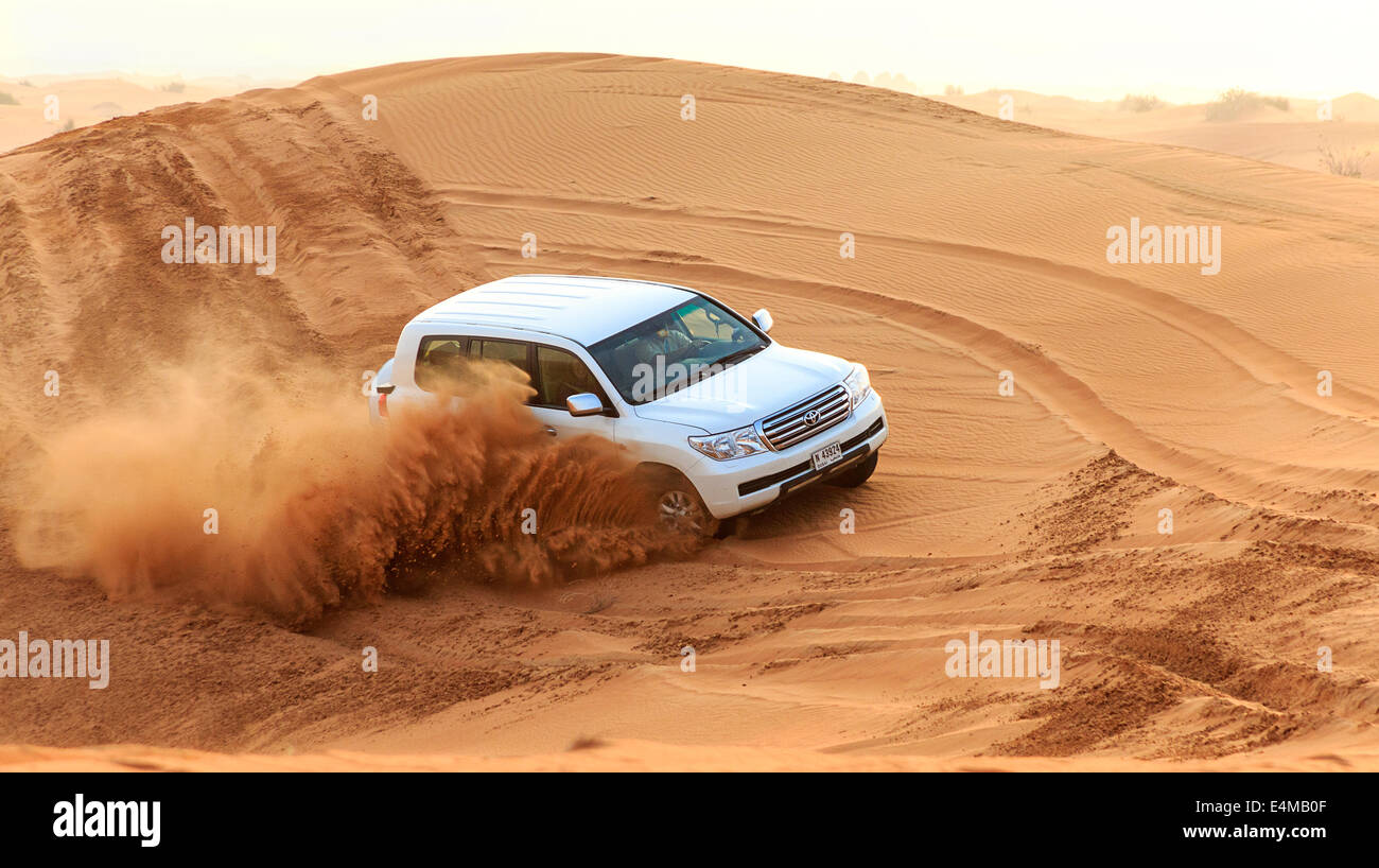 Dune bashing among the sand dunes outside Dubai, UAE Stock Photo - Alamy