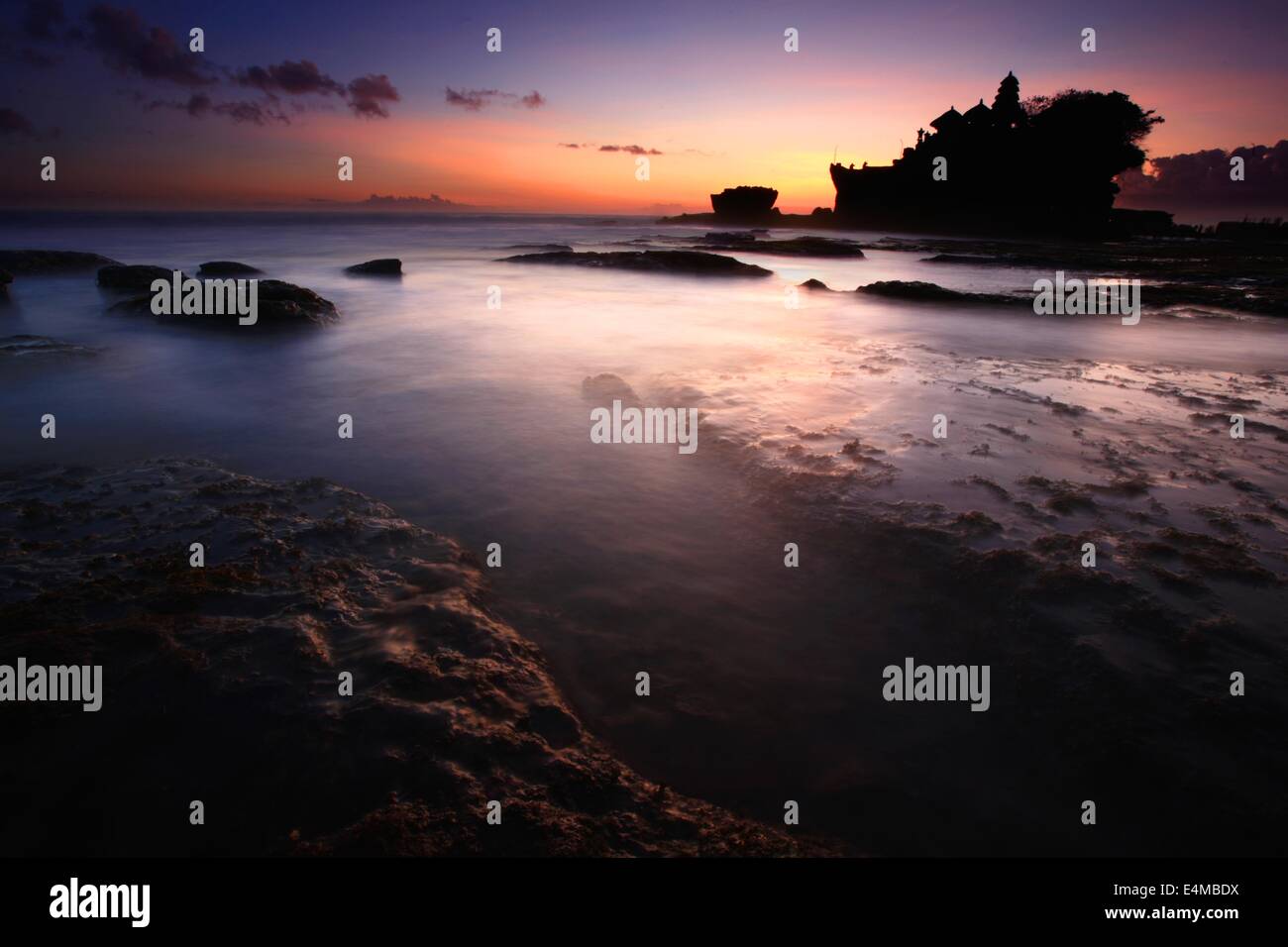 Sunset at Tanah Lot Temple in Bali, Indonesia Stock Photo - Alamy