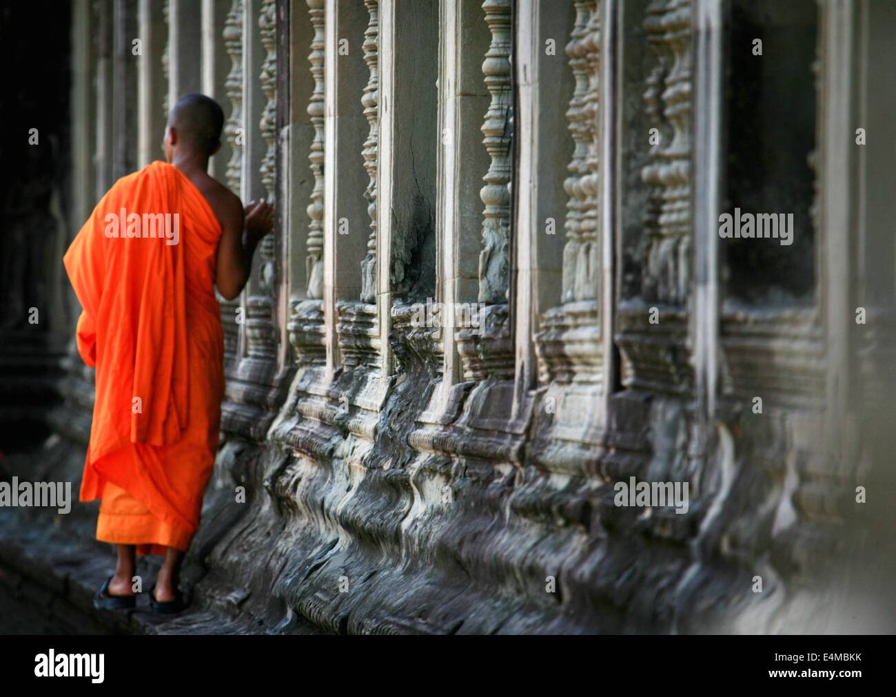 Buddhist monks in orange robes in Cambodia Stock Photo - Alamy