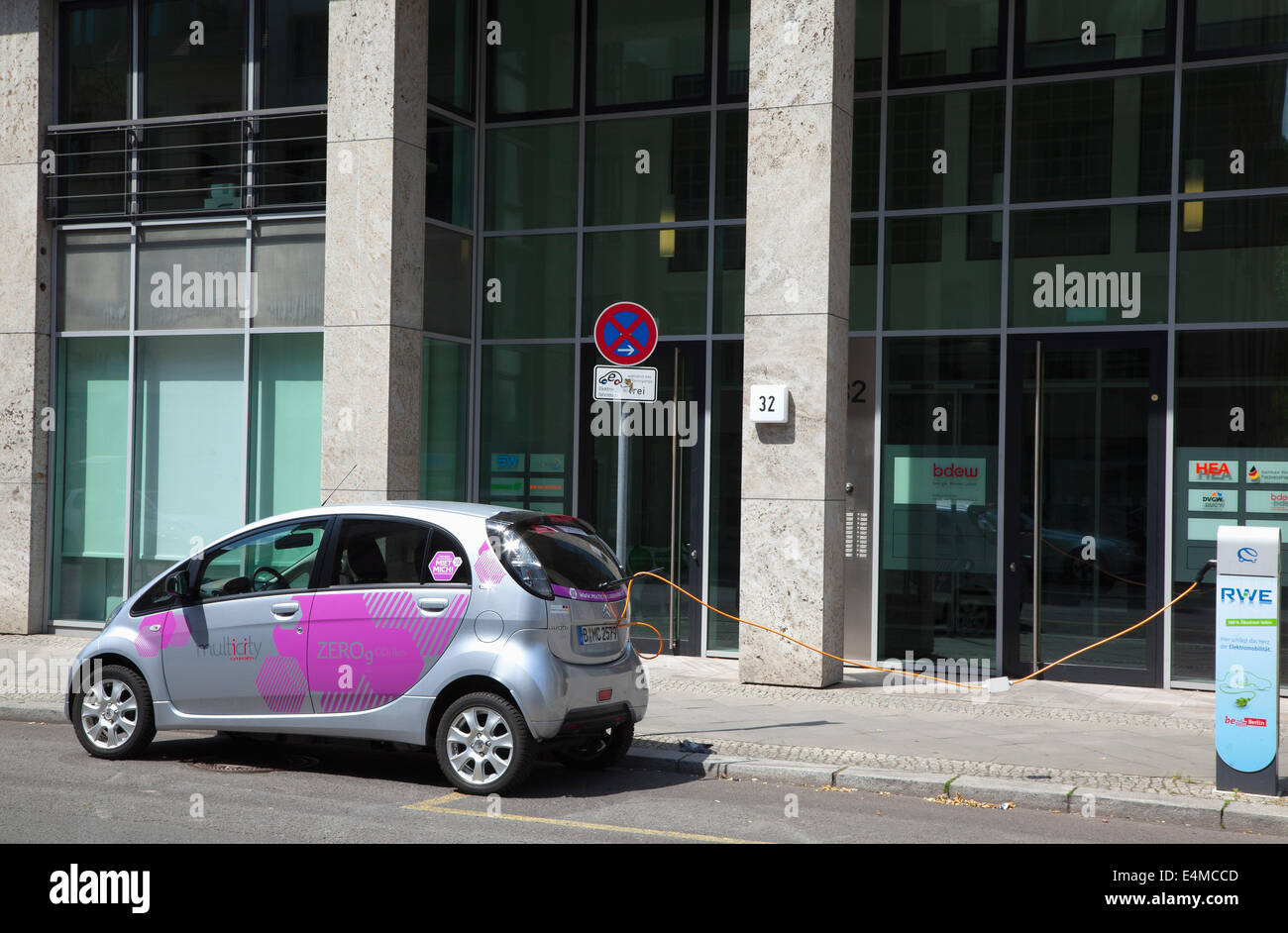 Germany, Berlin, Mitte, Citroen electric car being charged at roadside ...