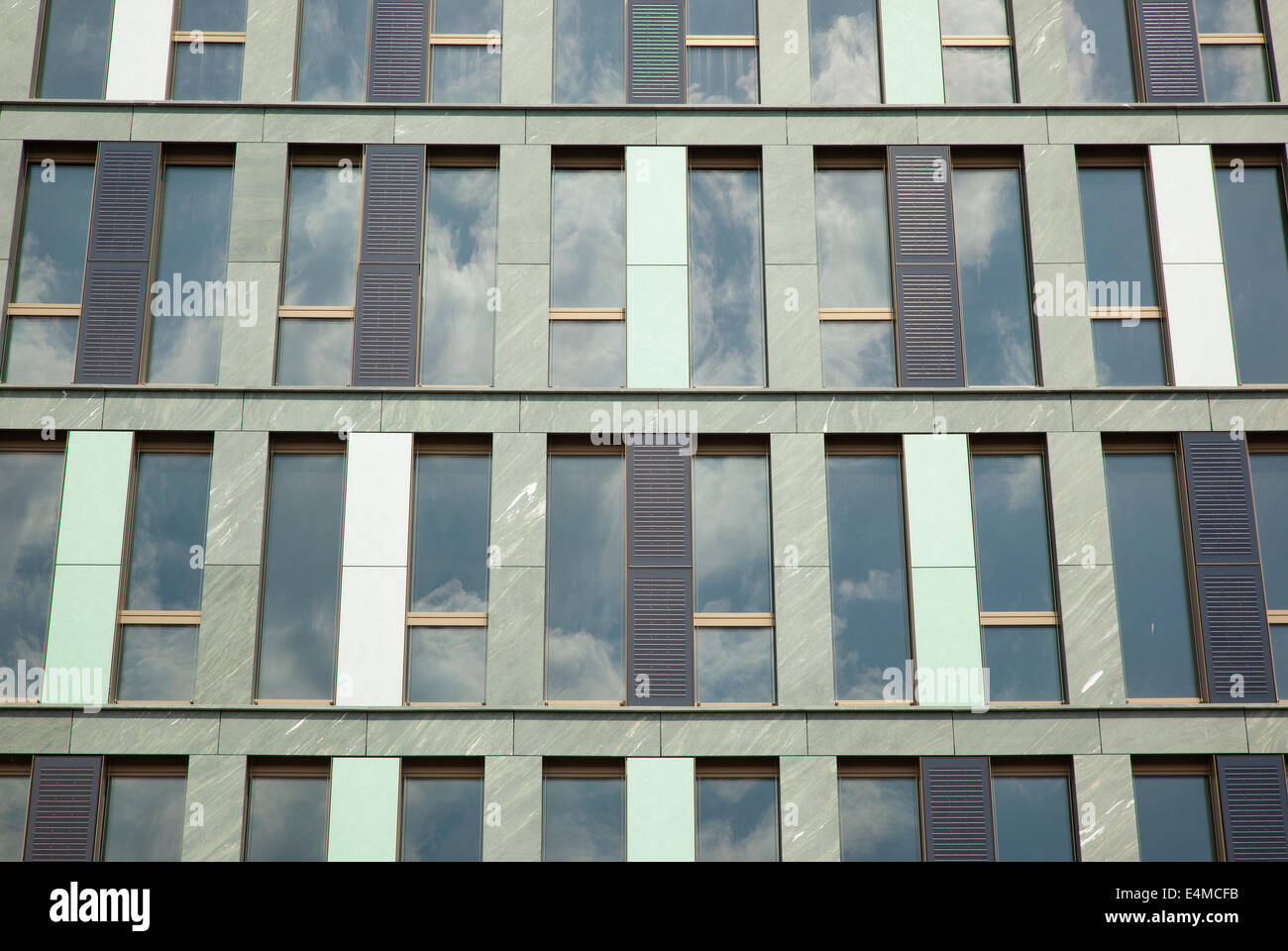 Germany, Berlin, Mitte, Exterior of office building clad with colourful ...